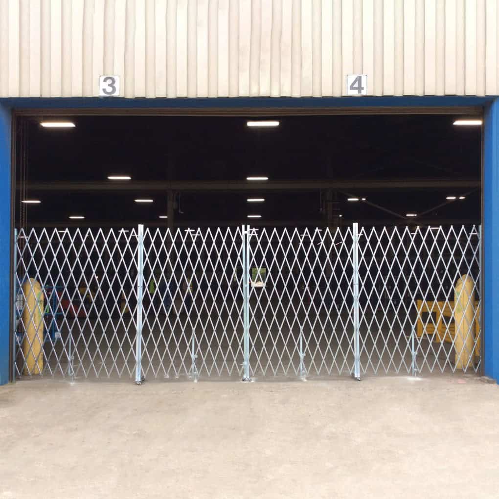Heavy-Duty Pair Folding Security Gates | Barron Equipment